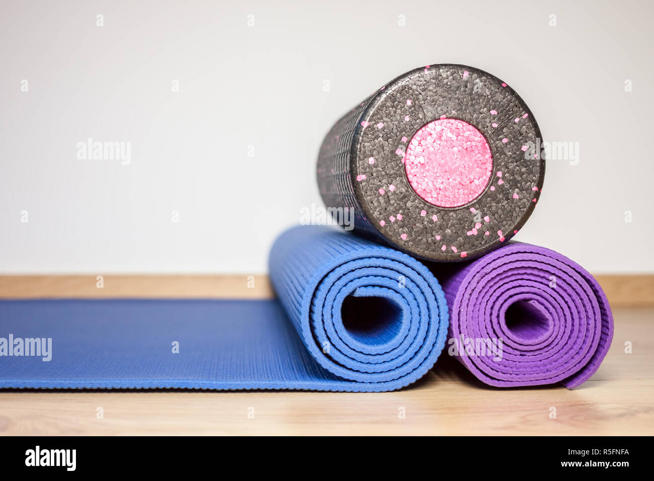 fitness mats and roll Stock Photo - Alamy