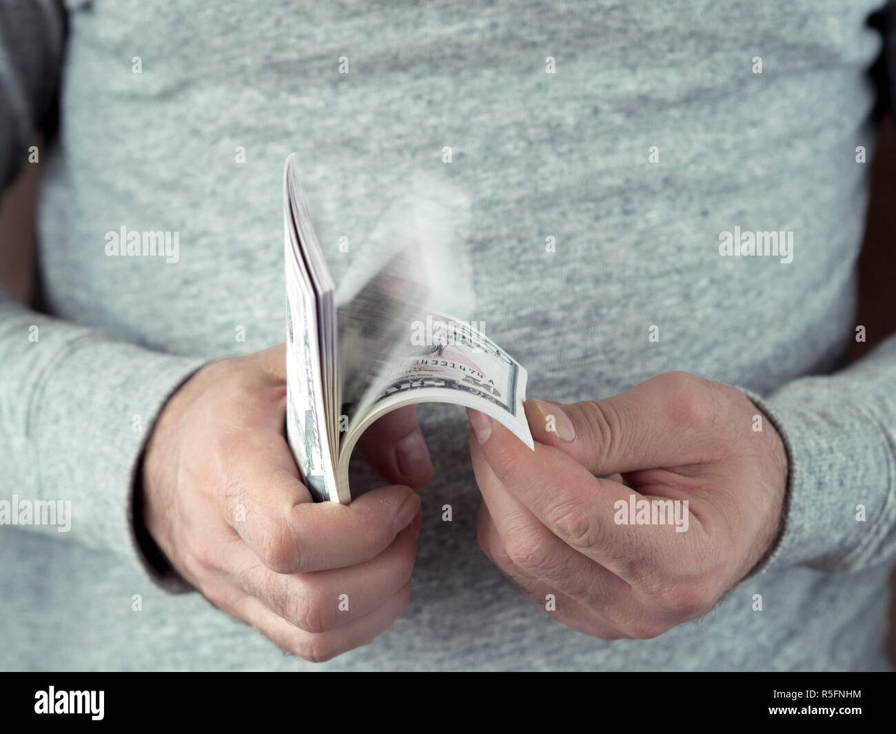 Hands counting dollars Stock Photo - Alamy