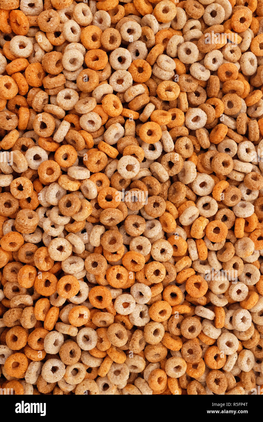 Healthy multigrain hoops breakfast cereal background Stock Photo - Alamy