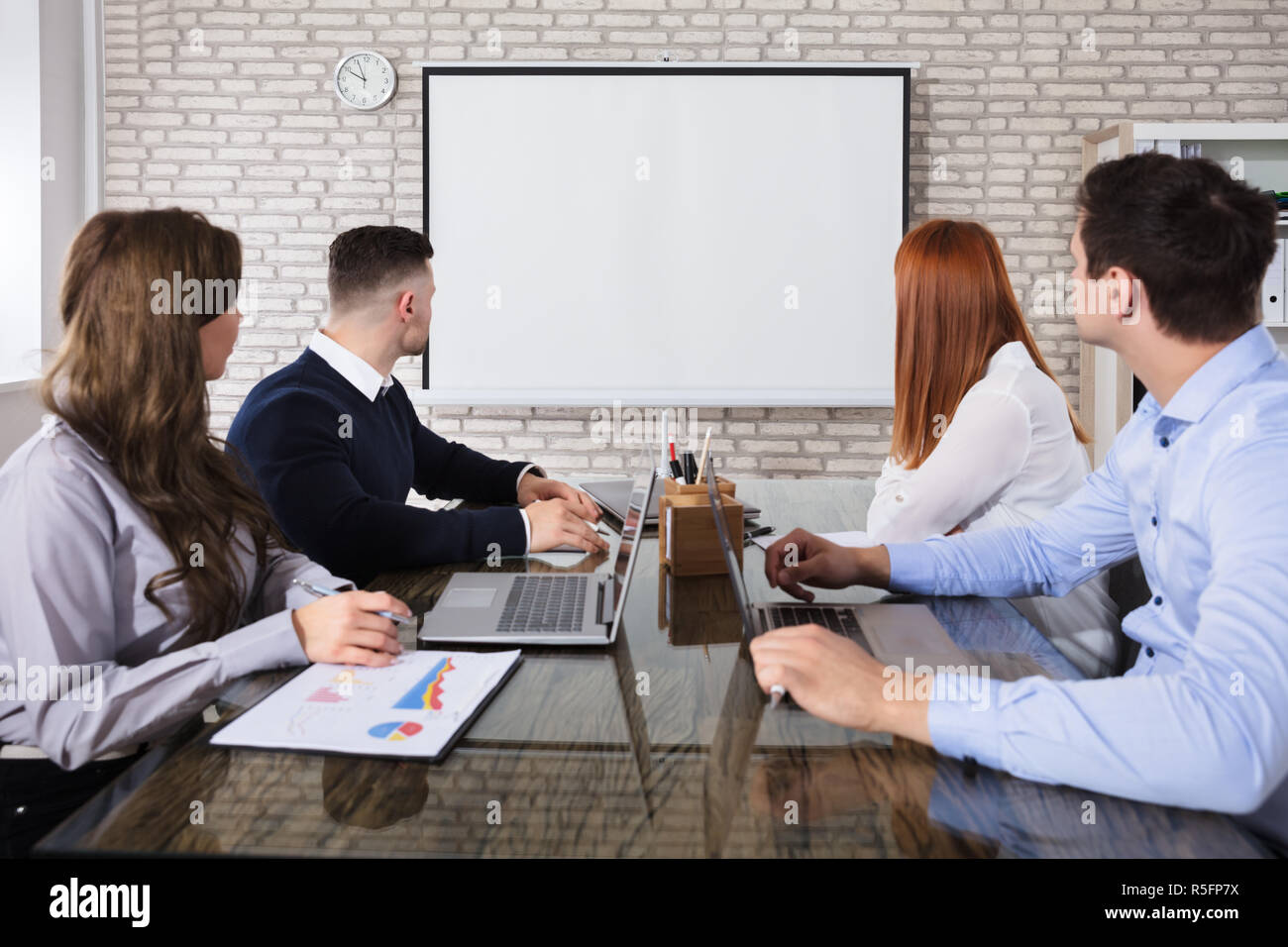 Business People Looking At White Board Stock Photo - Alamy
