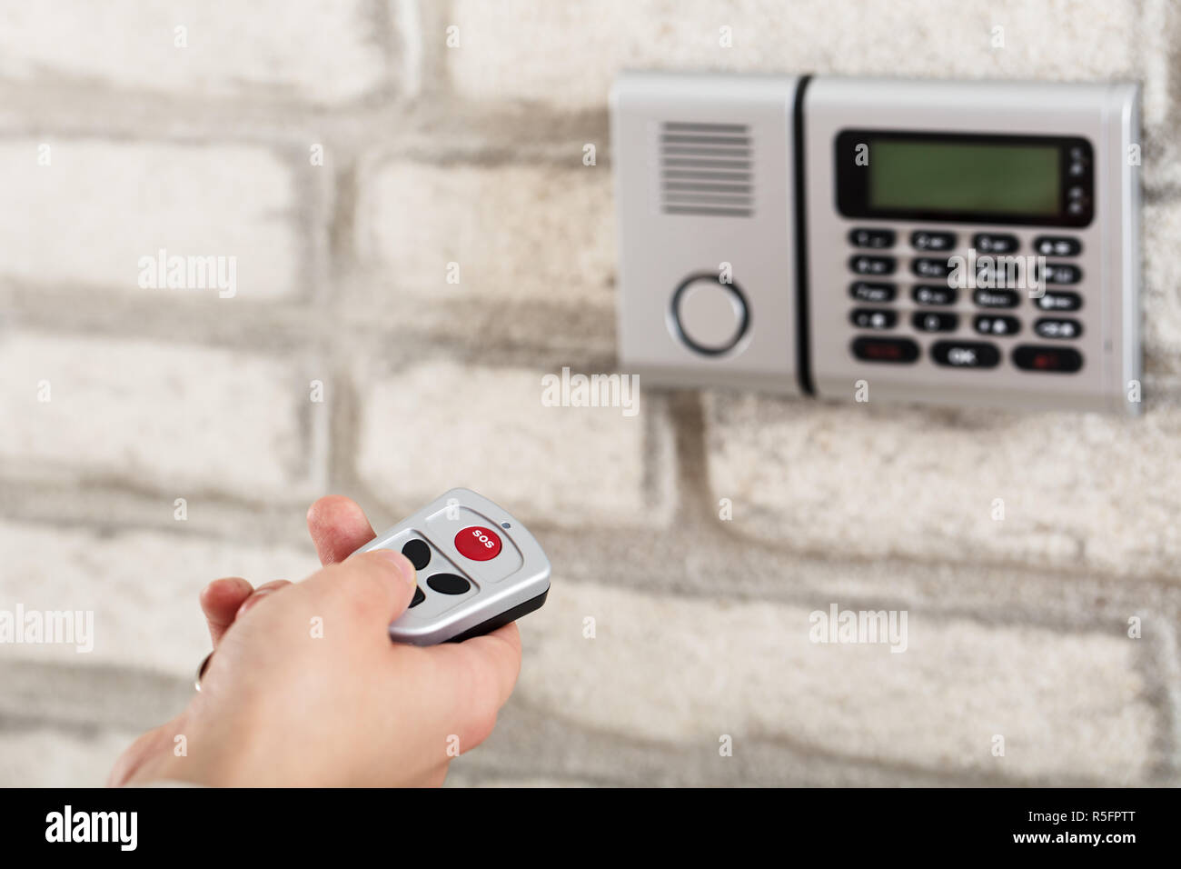 Hand Operating Door Security System With Remote Stock Photo - Alamy