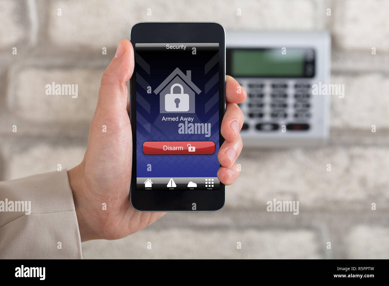 Hand Disarming Security System Of Door Stock Photo - Alamy