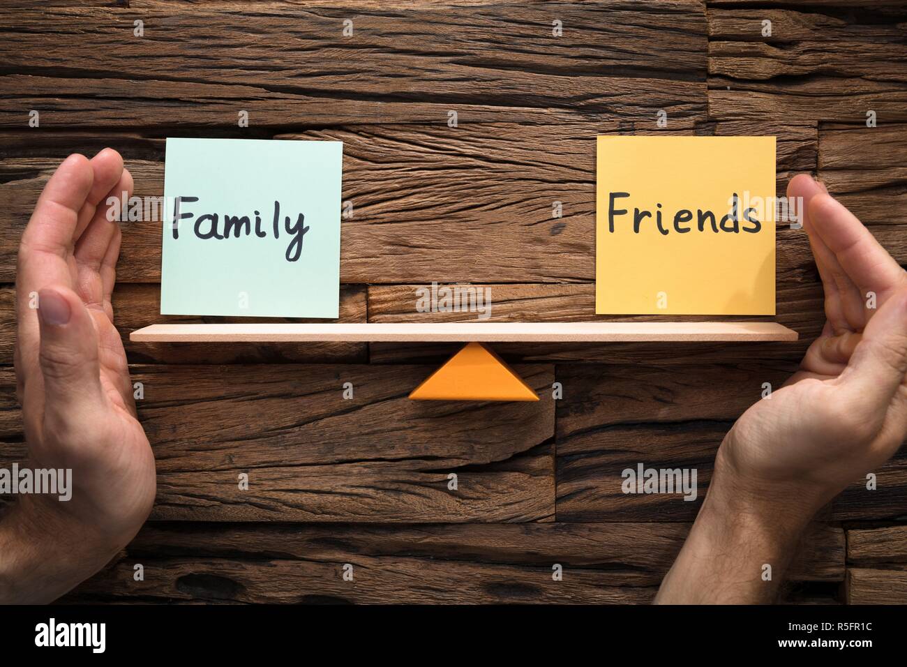 Businessman balancing between family hi-res stock photography and ...