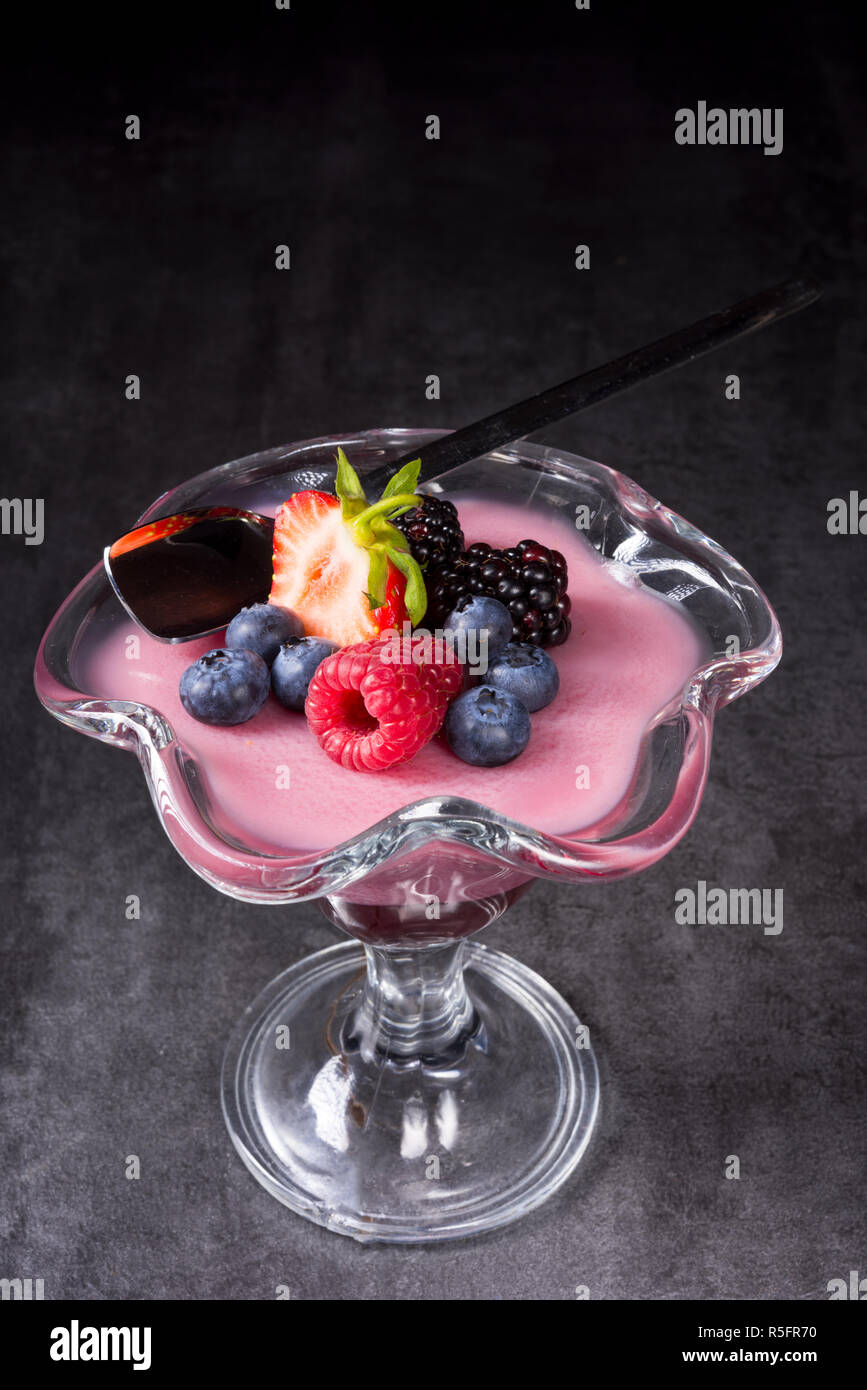 delicious pudding with wild berry Stock Photo - Alamy