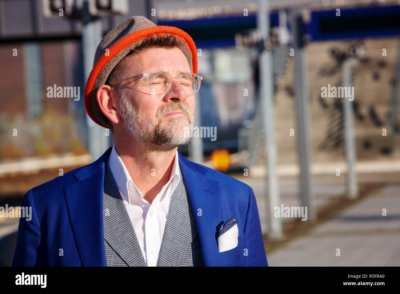 Man suitcase standing railway station hi-res stock photography and ...