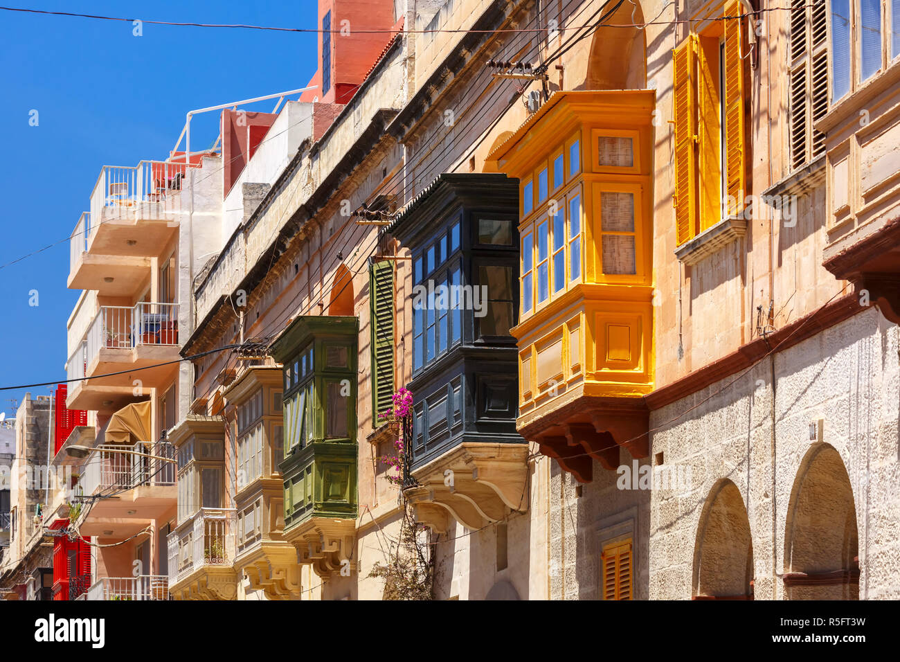 Traditional colorful wooden balconies, Malta Stock Photo - Alamy