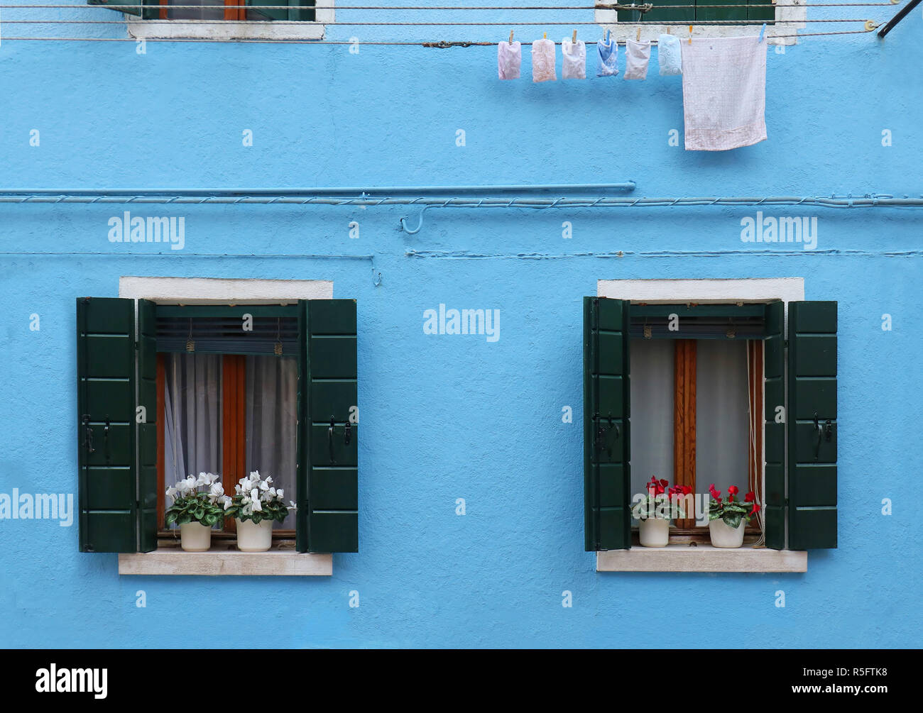 Blue facade windows Stock Photo - Alamy