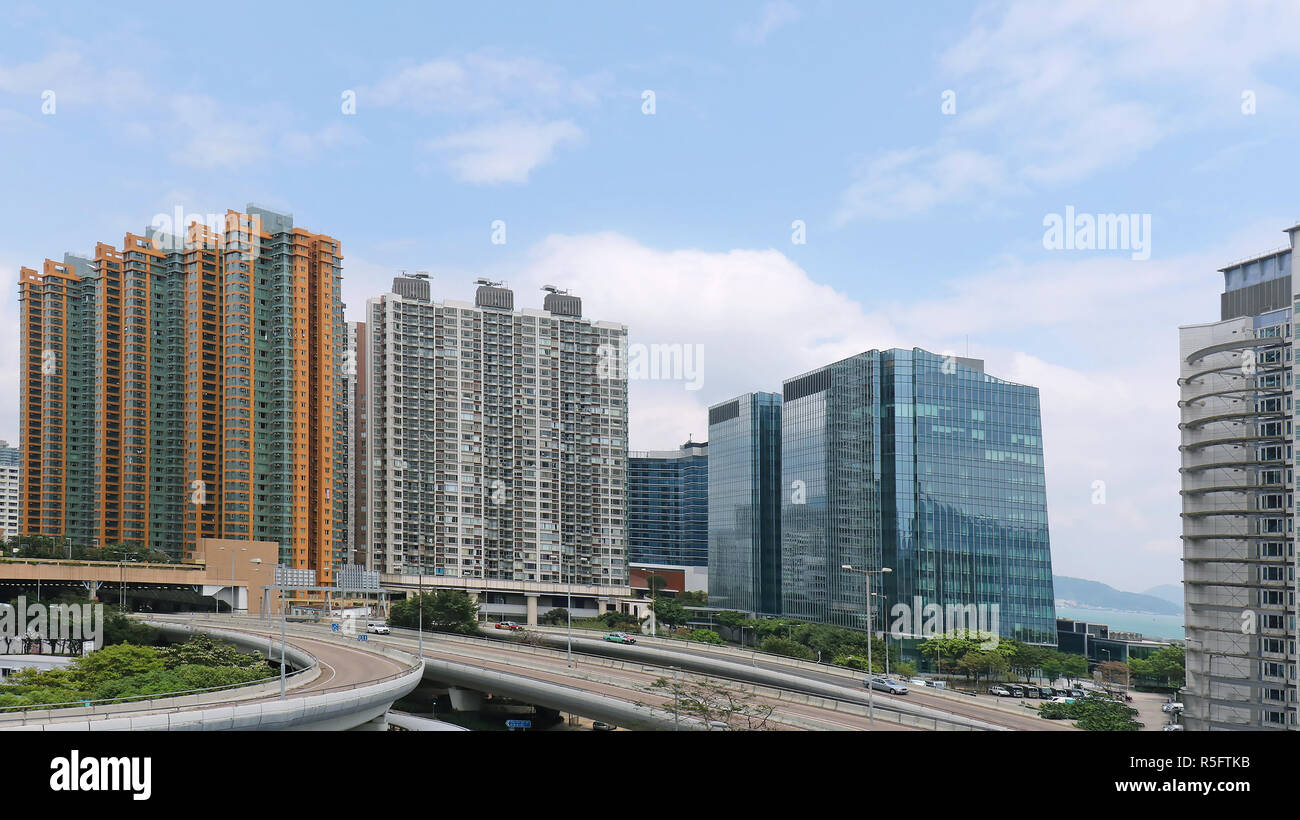 Buildings near highway Stock Photo - Alamy
