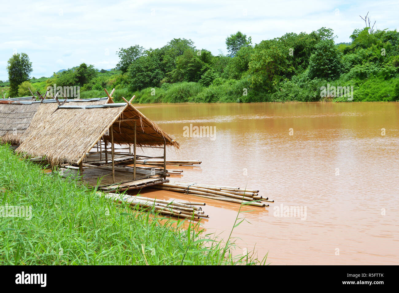 landscape of river mountain and bamboo houseboat raft floating for ...