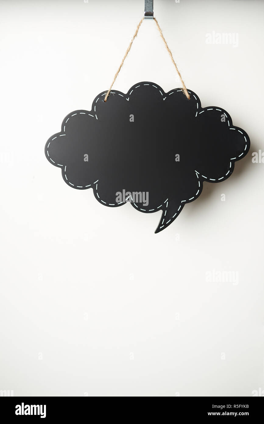 Dialog text message cloud hanging on white background Stock Photo - Alamy