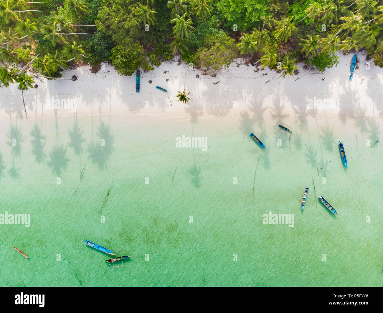 Aerial top down view boat tropical beach caribbean sea at Pasir Panjang ...