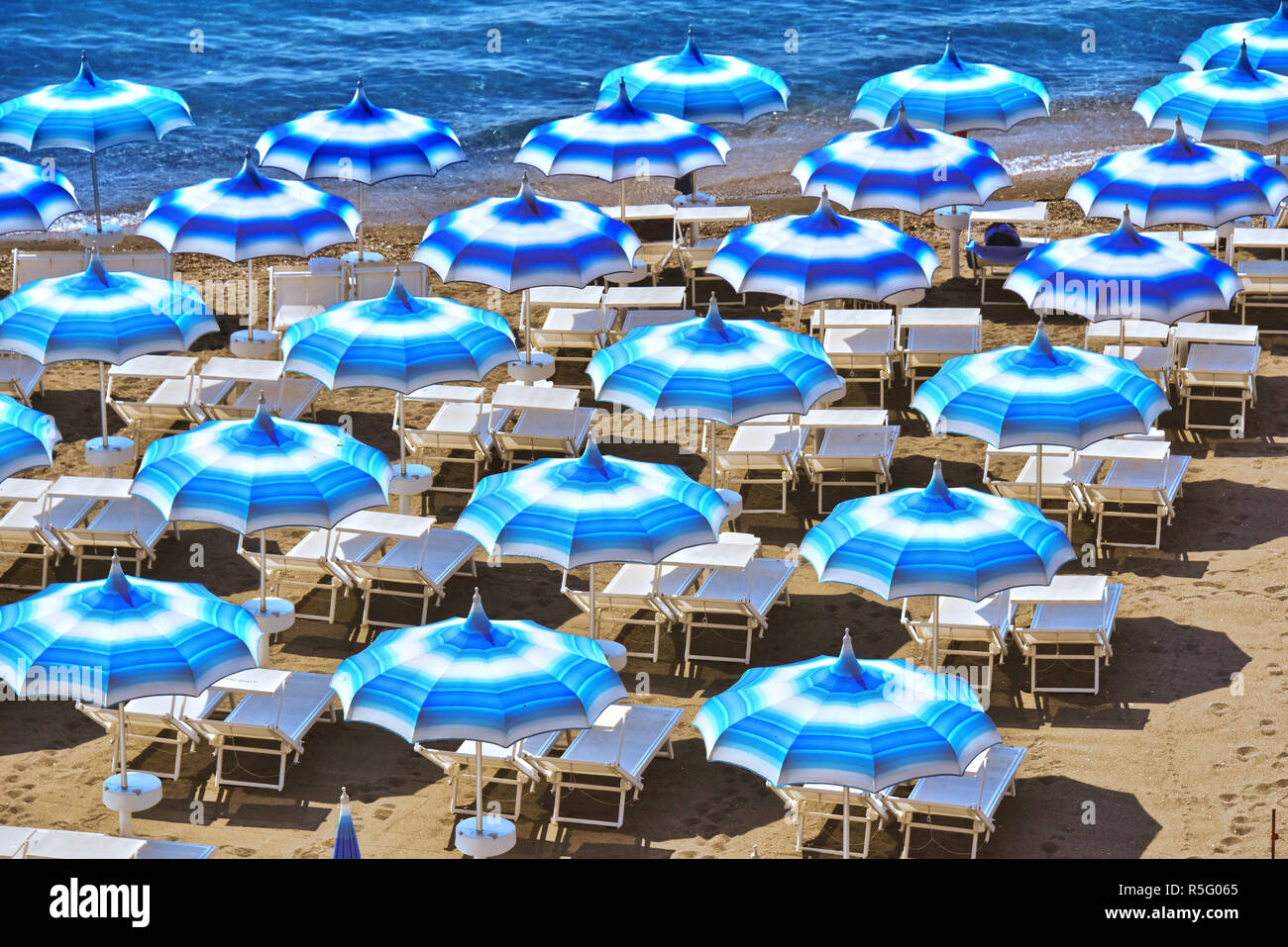 Mediterranean beach during hot summer day Stock Photo - Alamy