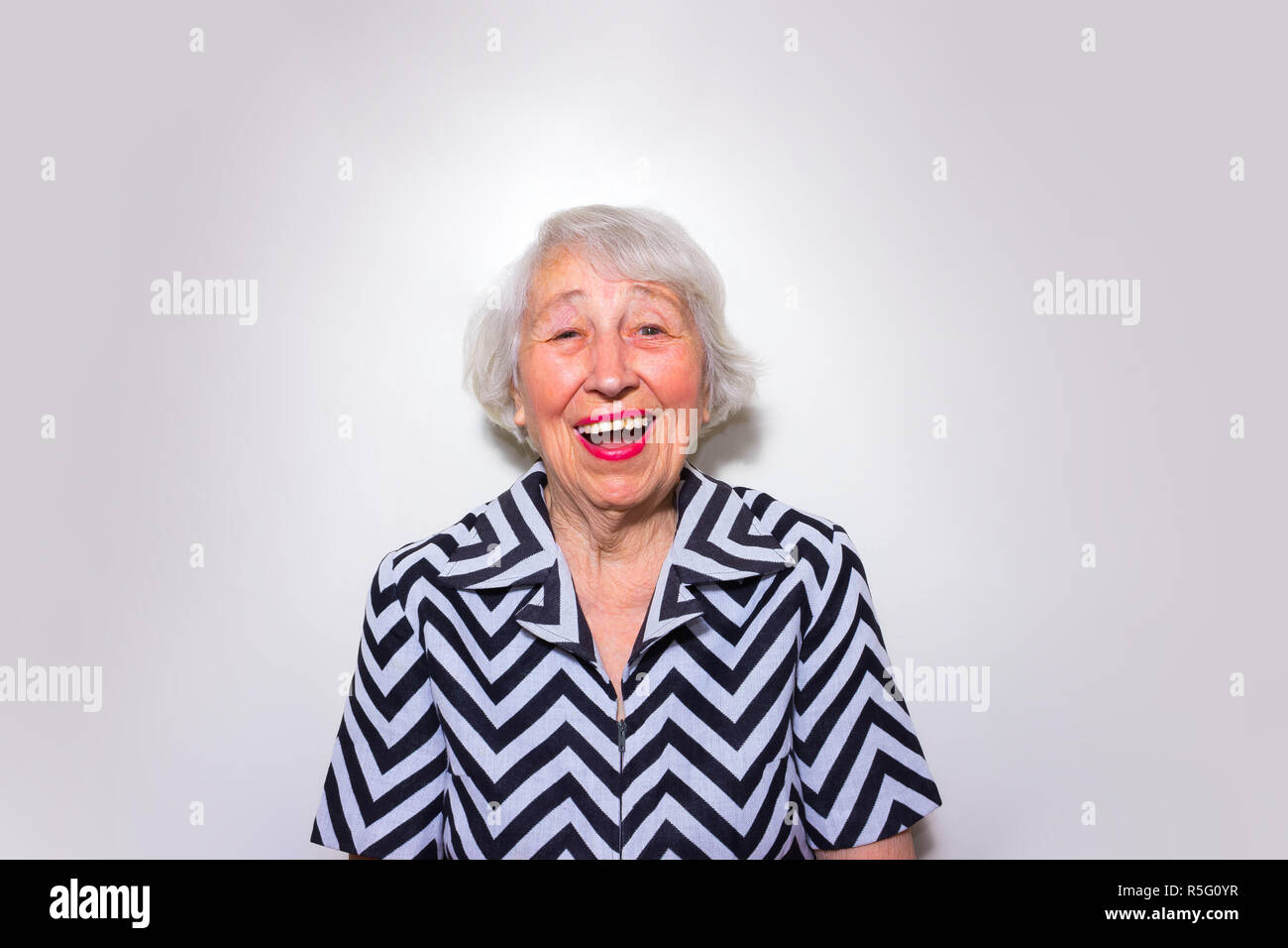 The portrait of a laughing old woman Stock Photo - Alamy