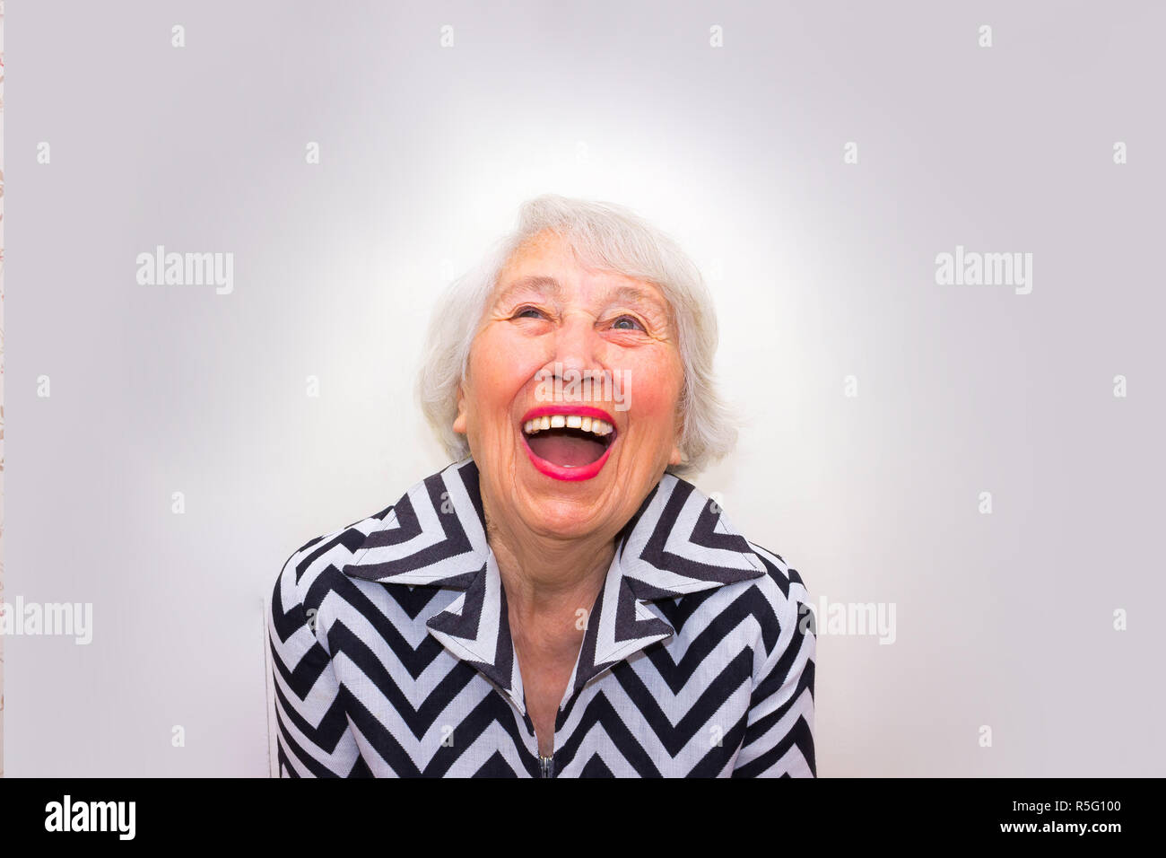 The portrait of a laughing old woman Stock Photo - Alamy