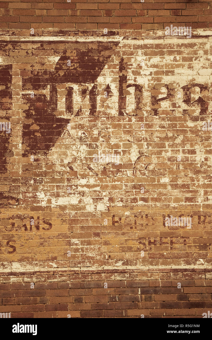USA, Alabama, Decatur, faded wall advertsing sign Stock Photo - Alamy