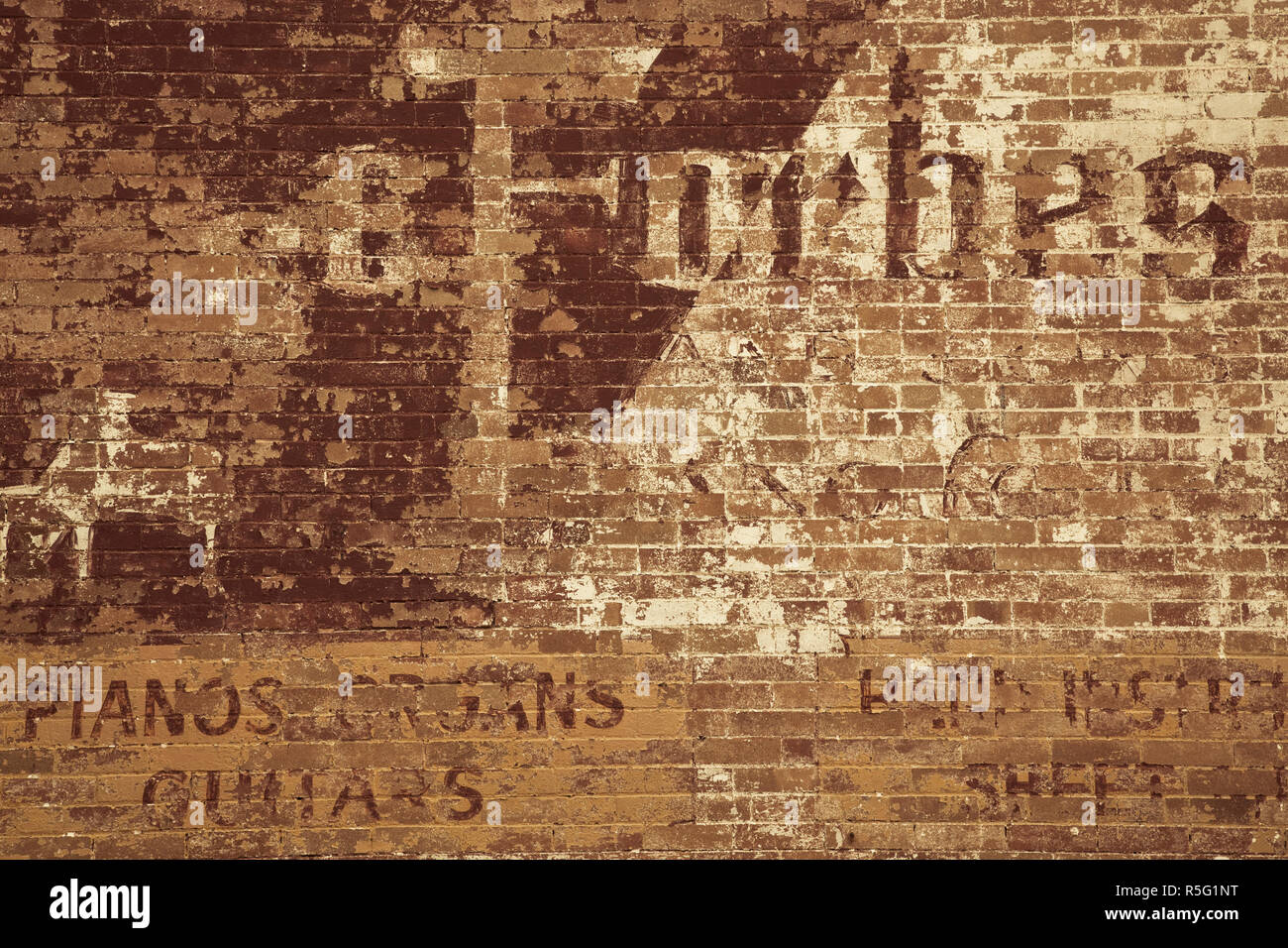 USA, Alabama, Decatur, faded wall advertsing sign Stock Photo - Alamy