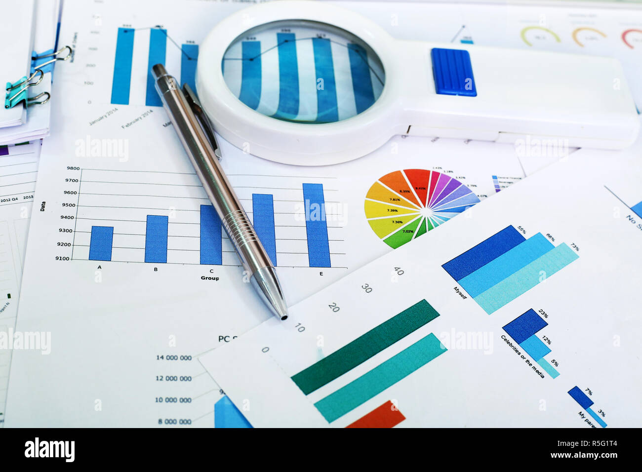 Picture of pen and Magnifying glass on the graph paper Stock Photo - Alamy