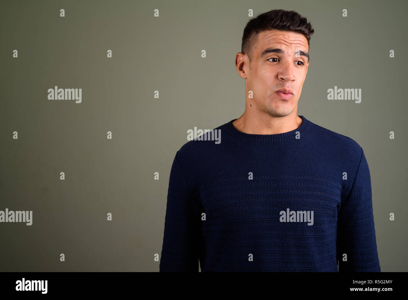Man wearing sweater hi-res stock photography and images - Alamy