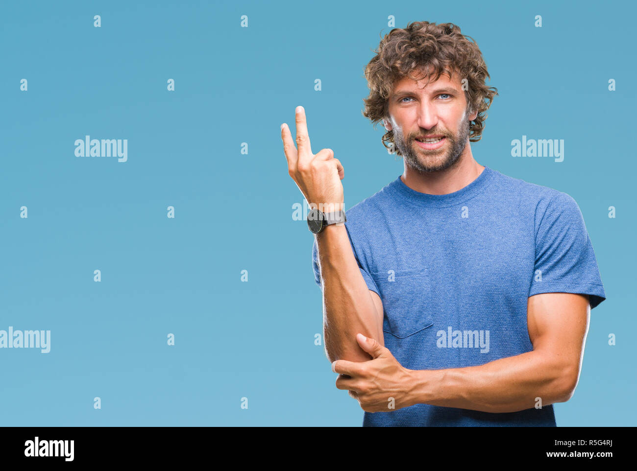 Handsome hispanic model man over isolated background smiling with happy ...