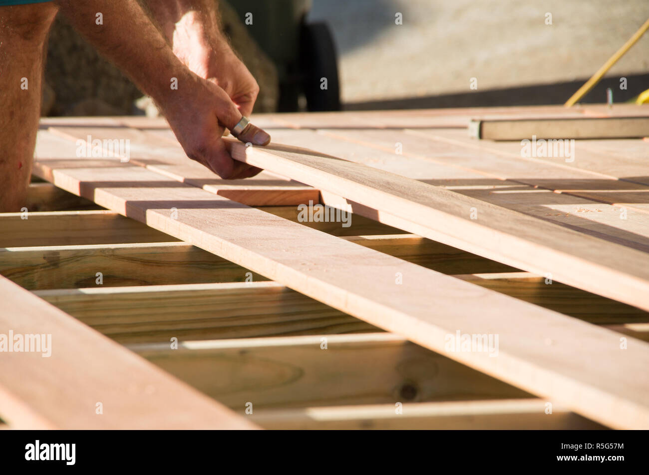 Worker placing timber material planks hi-res stock photography and ...