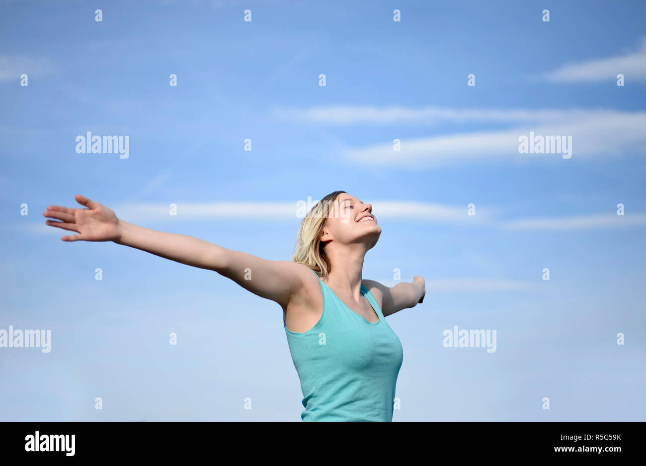 young woman cheers Stock Photo - Alamy