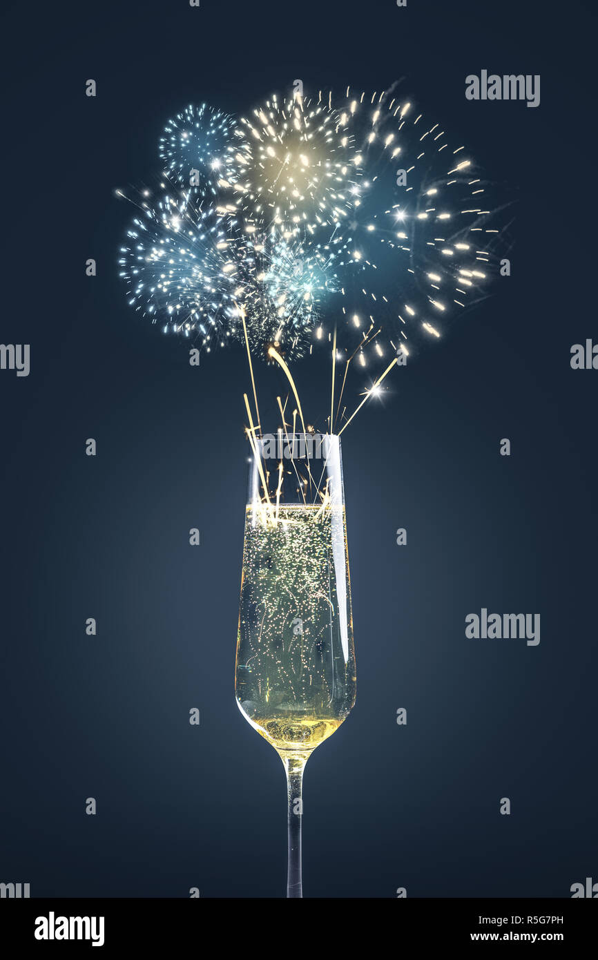 Champagne glass shooting a display of fireworks Stock Photo - Alamy