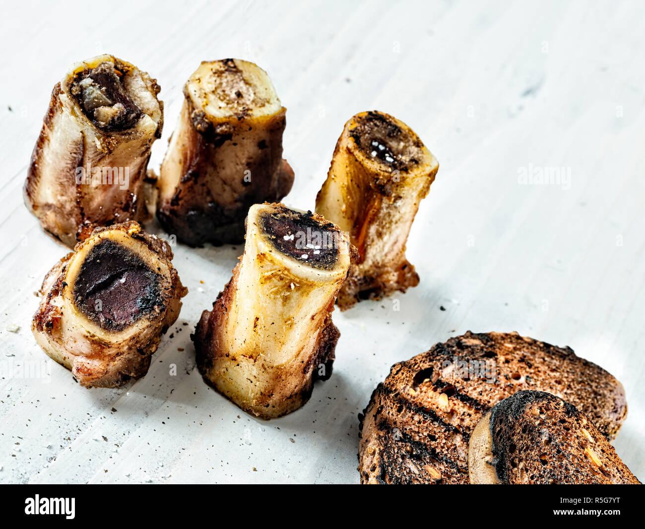 rustic english bone marrow toast Stock Photo - Alamy