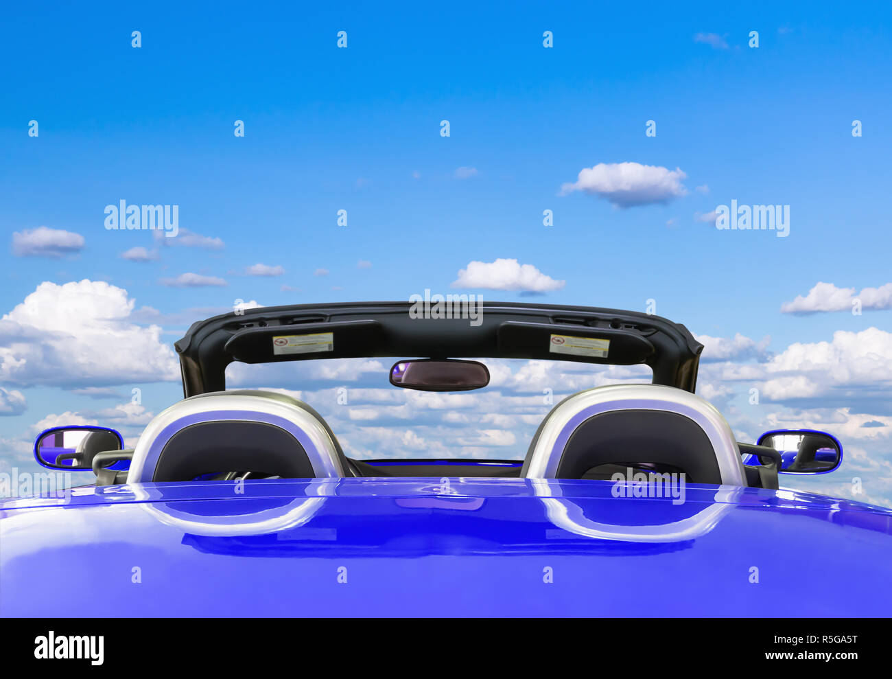 Blue car with blue sky background Stock Photo - Alamy