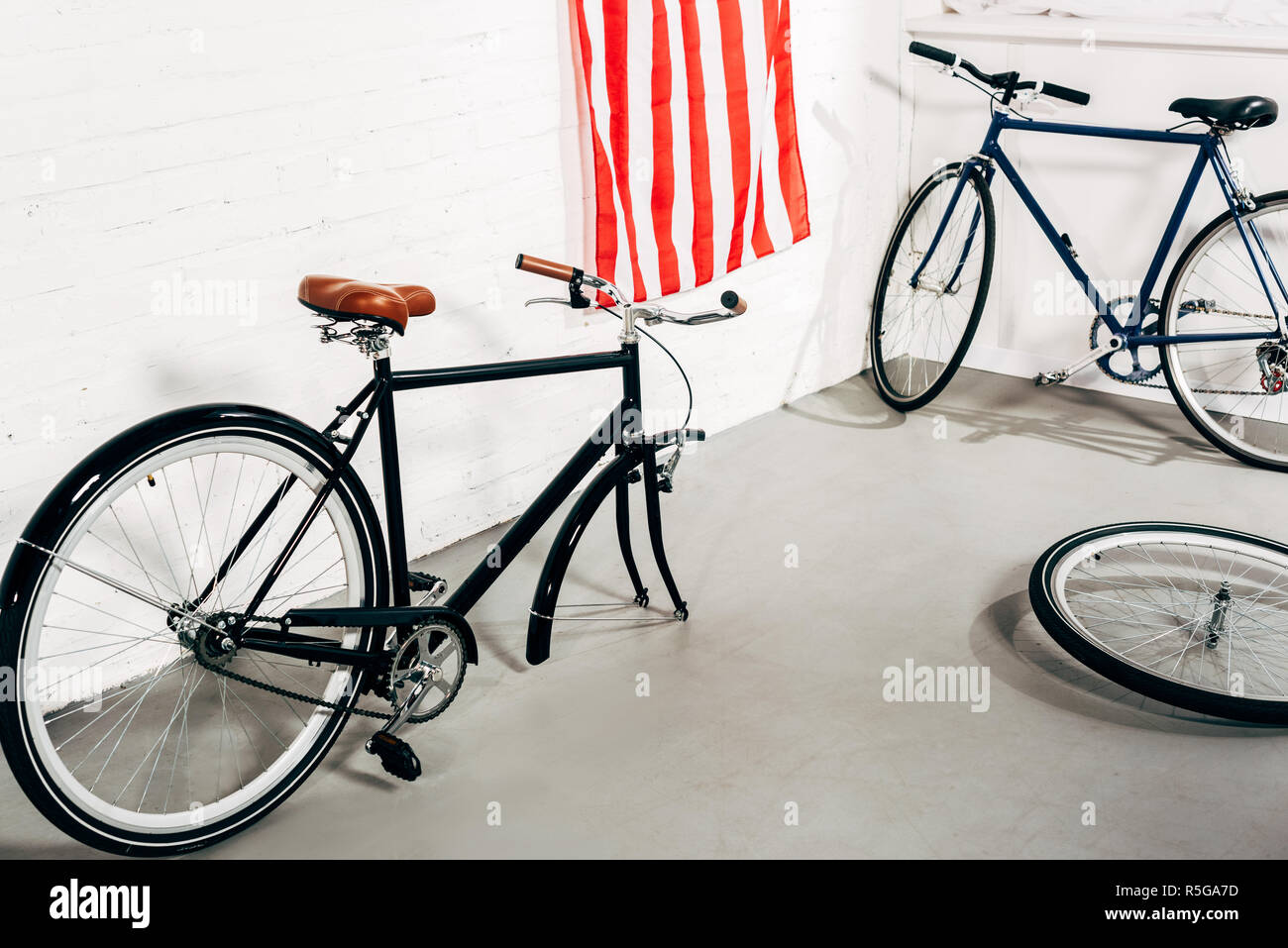 high angle view of disassembled bicycle near wheel in workshop Stock ...