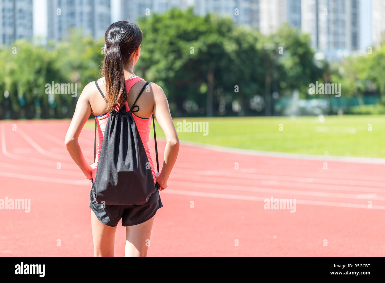 Back view of sport woman Stock Photo - Alamy