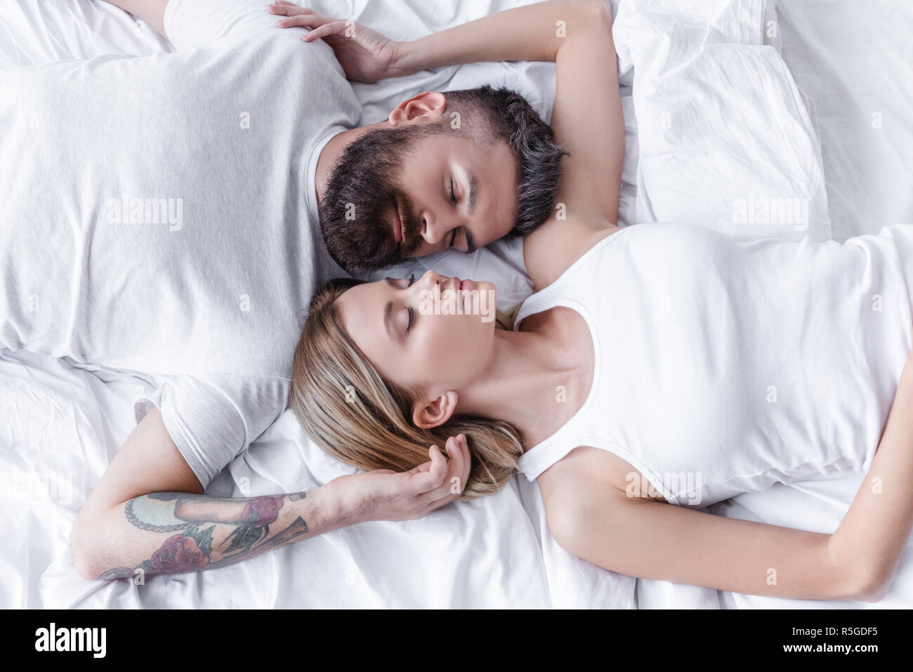 Romantic couple head lying hi-res stock photography and images - Alamy
