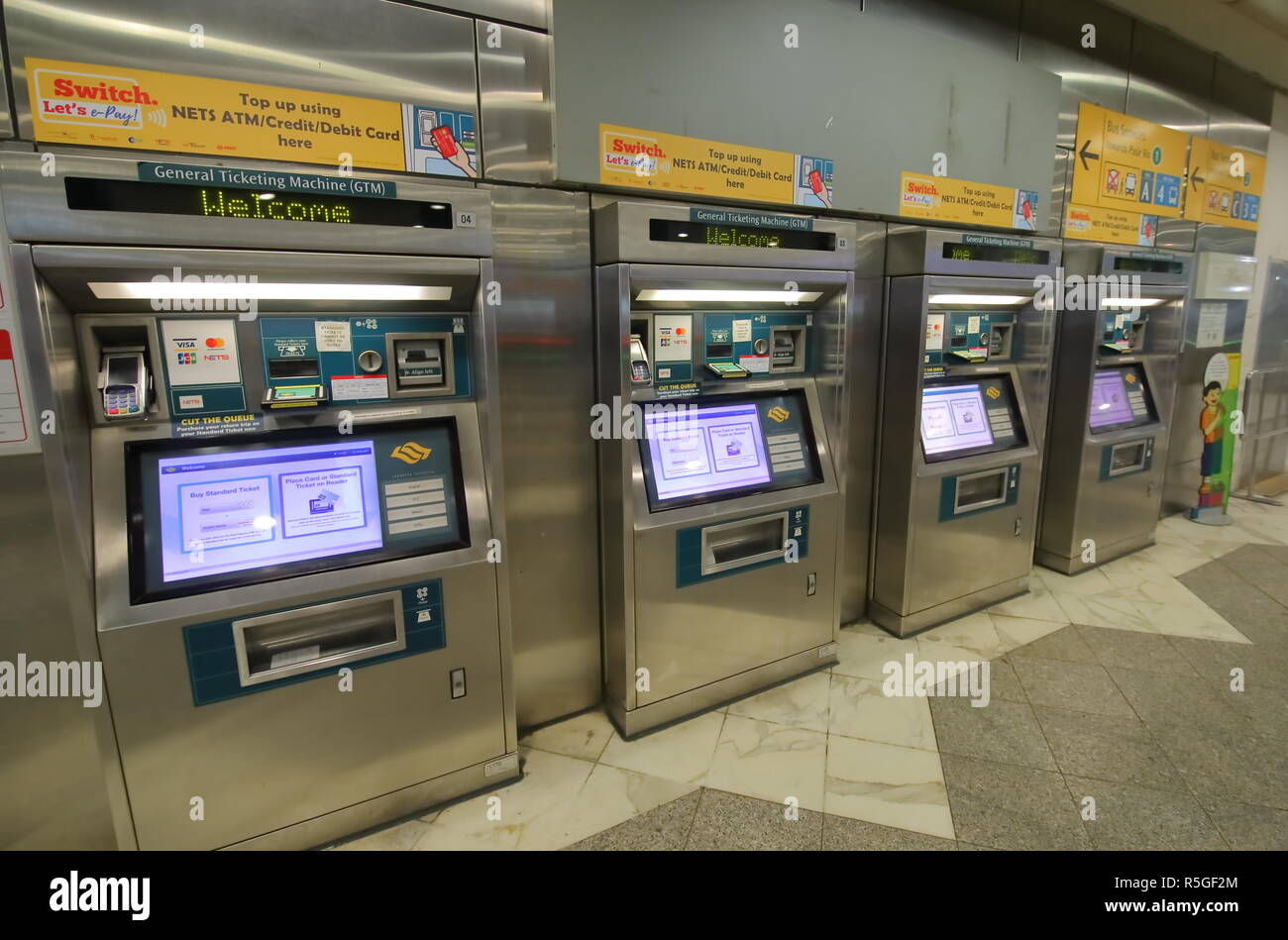 MRT subway station ticket machine in Singapore Stock Photo - Alamy