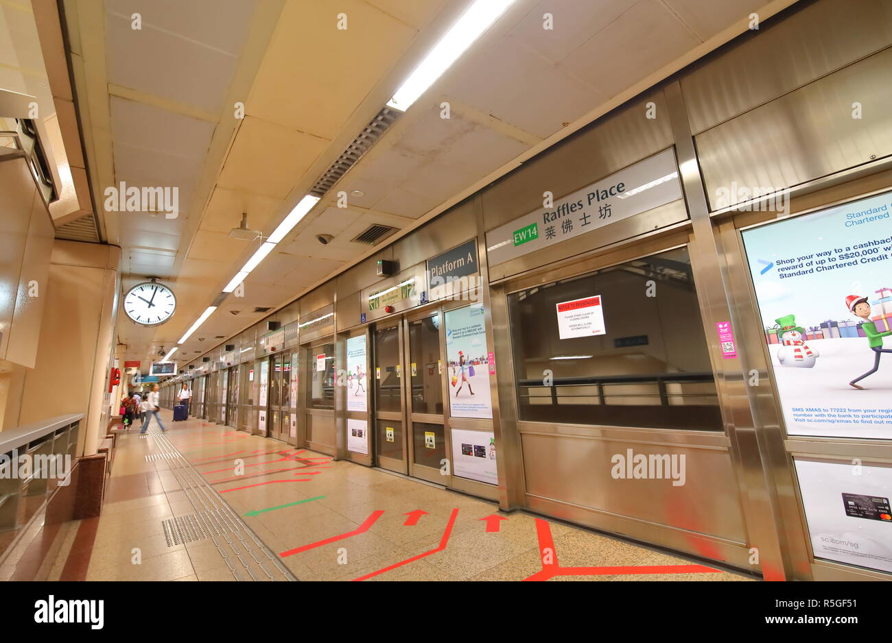 Raffles place mrt station hi-res stock photography and images - Alamy