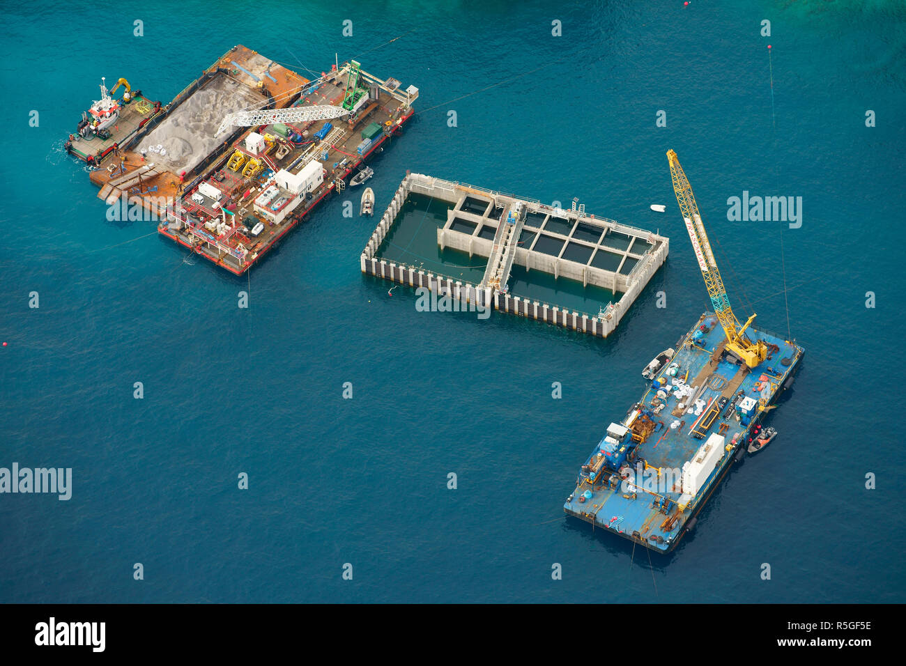 AERIAL VIEW. Floating concrete caisson to be used for a large project ...