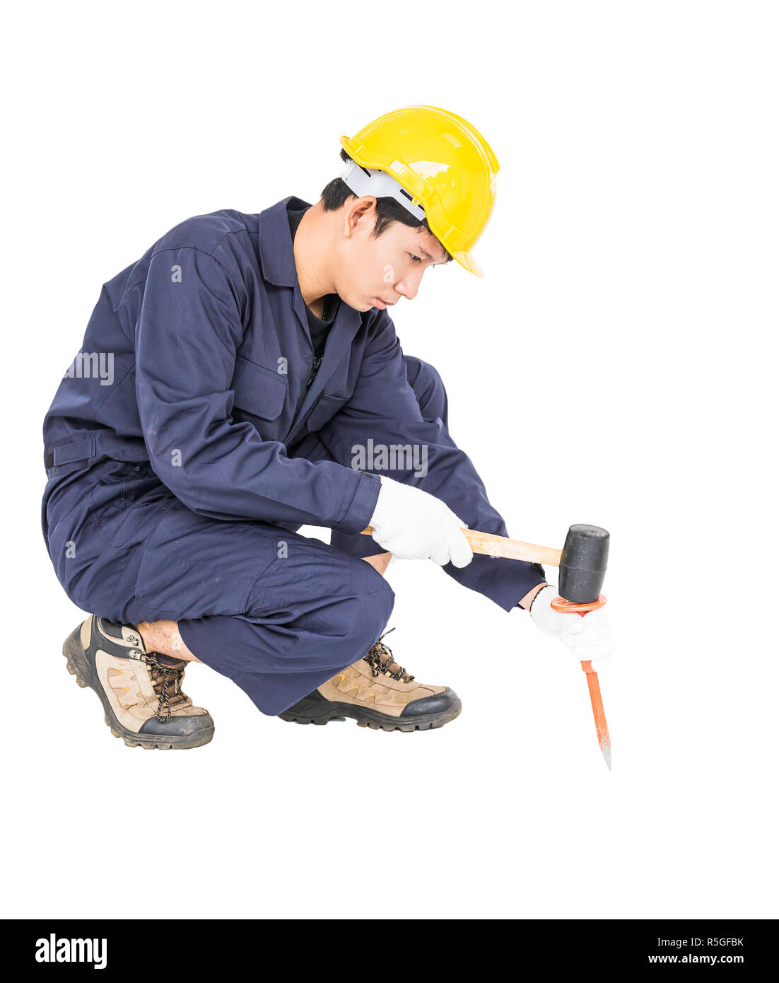Man hold hammer and cold chisel on white Stock Photo - Alamy