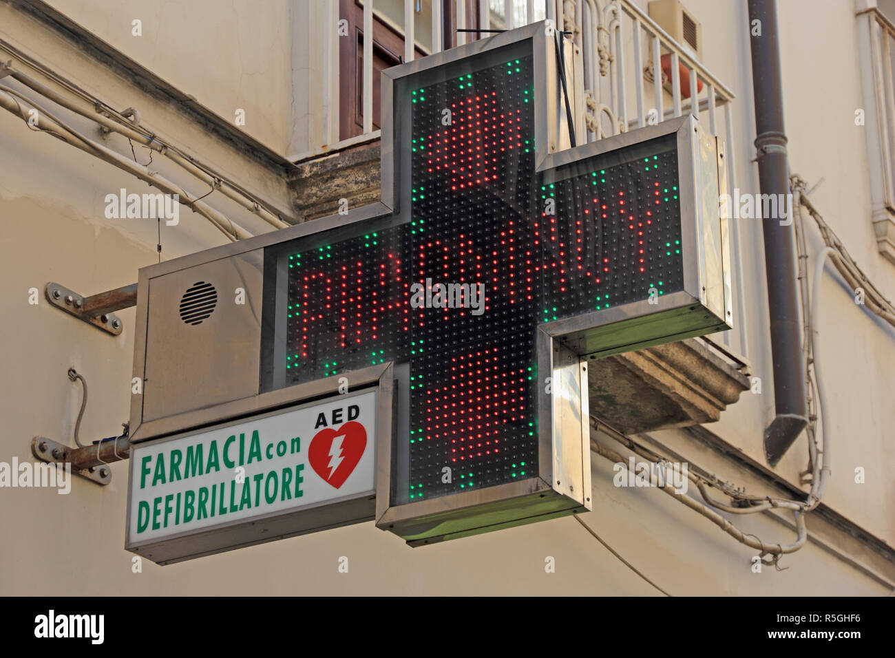 Illuminated sign outside chemist shop, Sorrento, Italy Stock Photo - Alamy