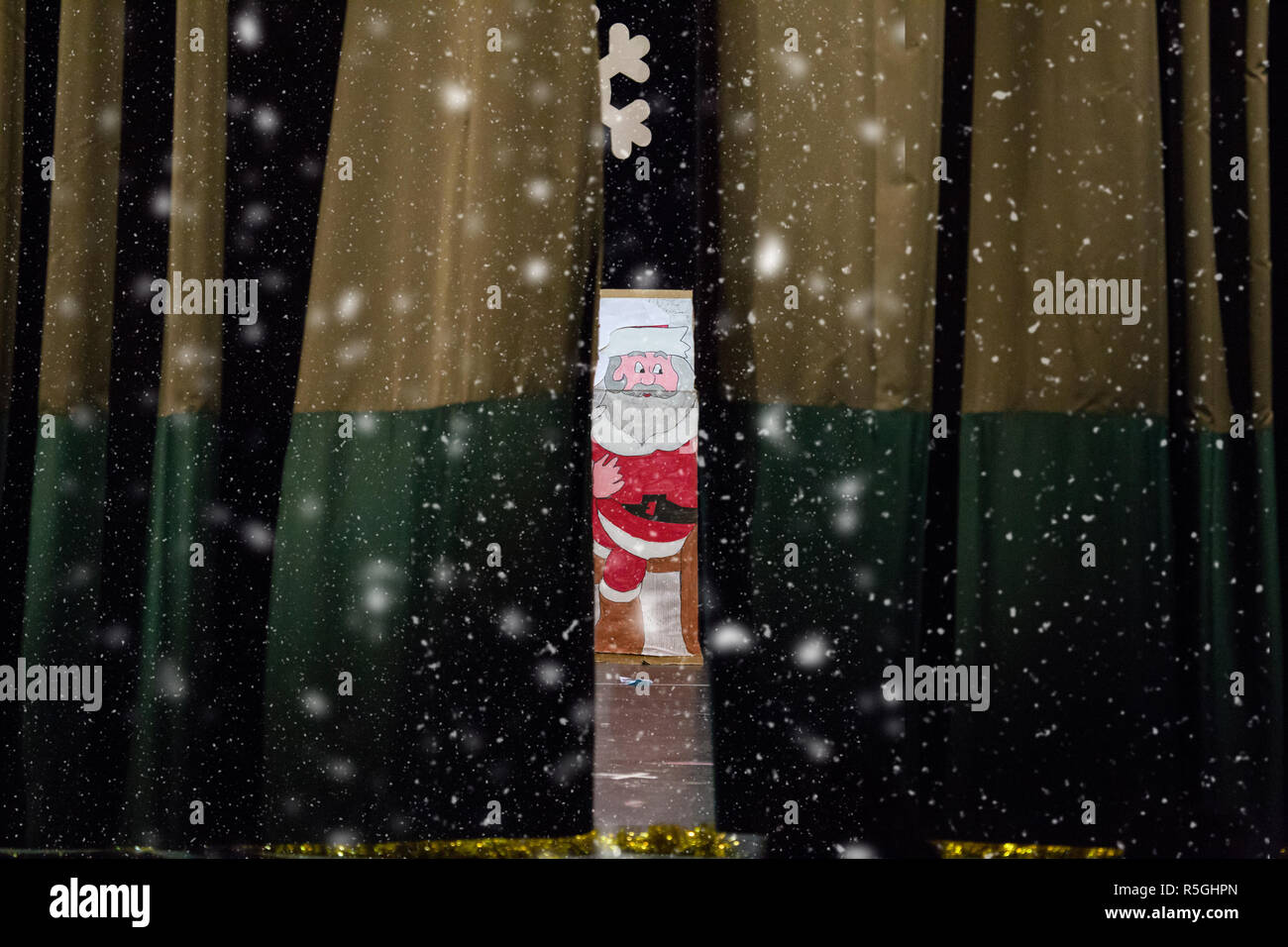 christmas recitation with open curtain and santa claus in the ...