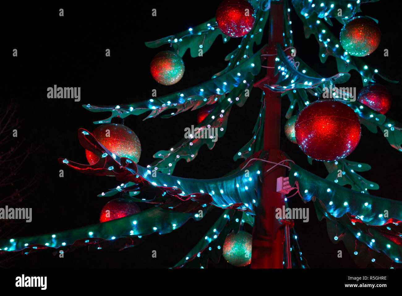 christmas tree with lights and red balls Stock Photo - Alamy