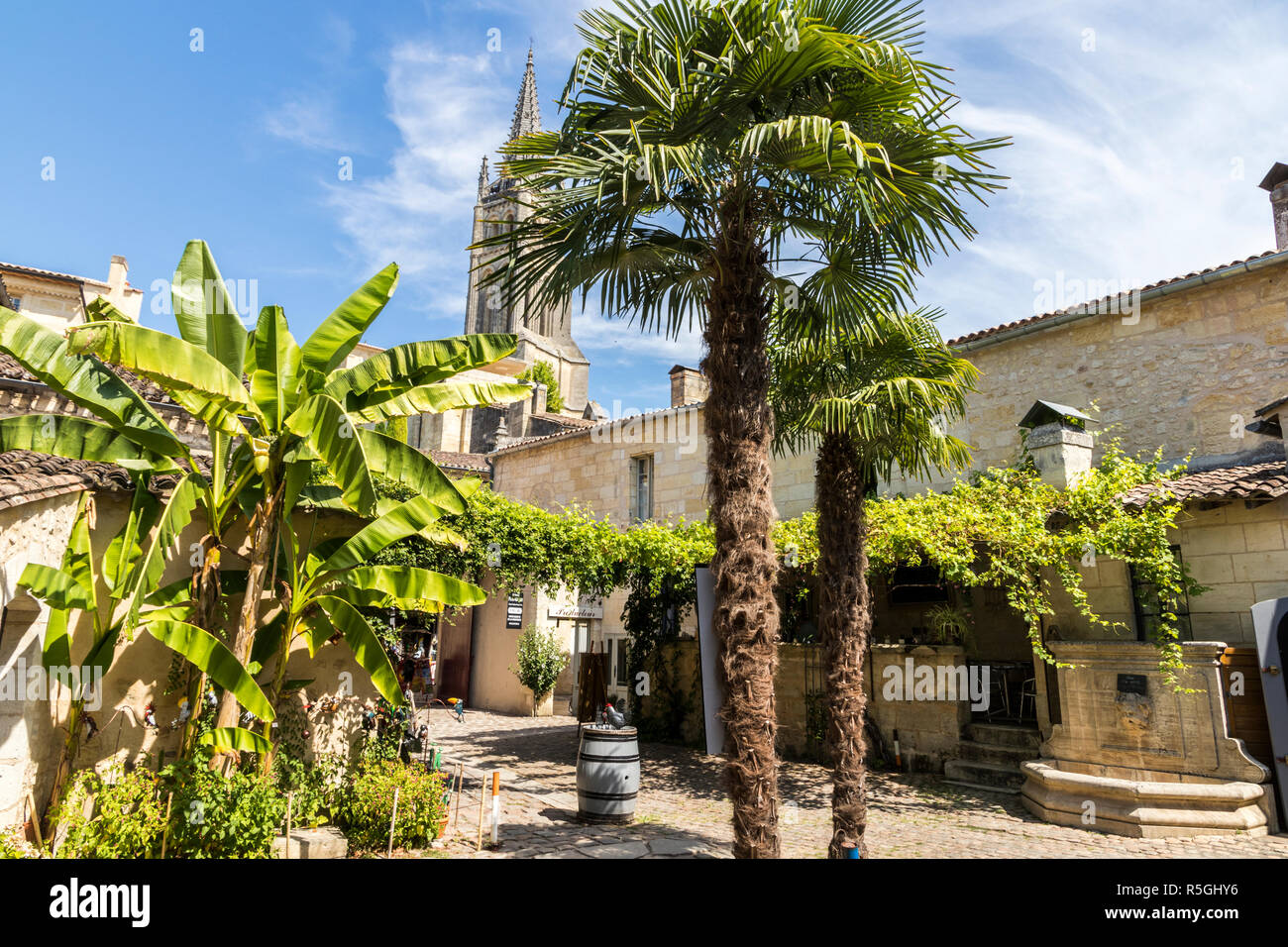 Saint-Emilion, France. Views of a courtyard and the monolithic church ...