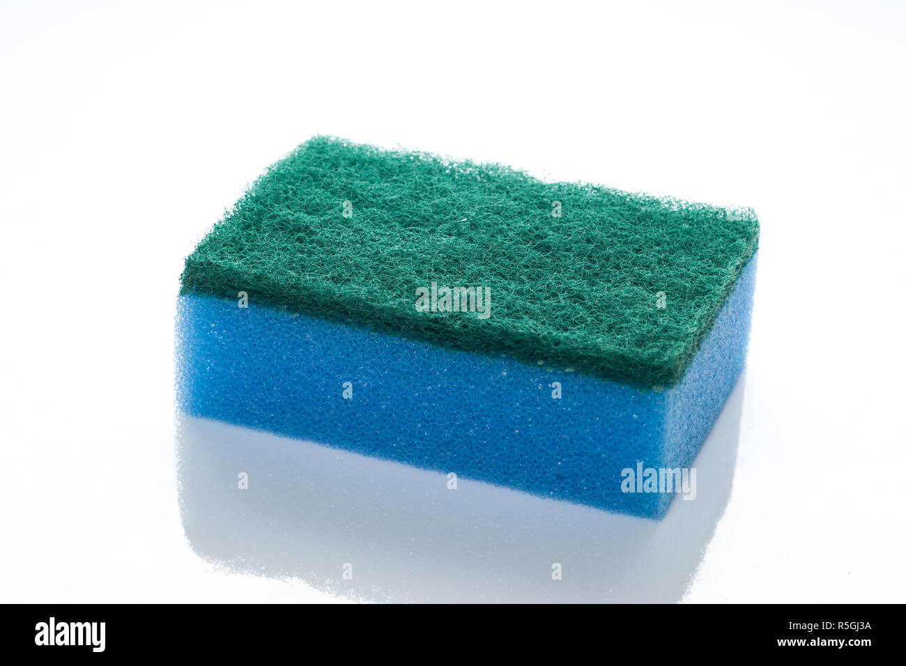 Kitchen sponges isolated on white background Stock Photo - Alamy