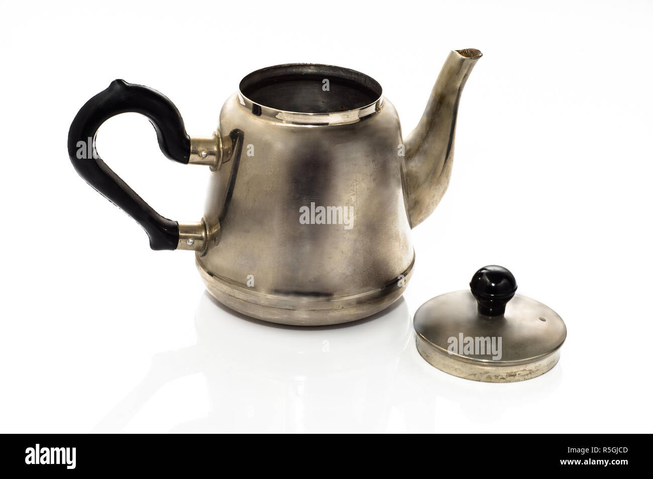 Old teapot on a white background Stock Photo - Alamy