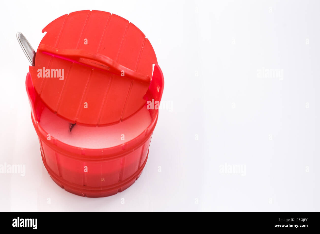 Red salt shaker isolated on a white background Stock Photo - Alamy