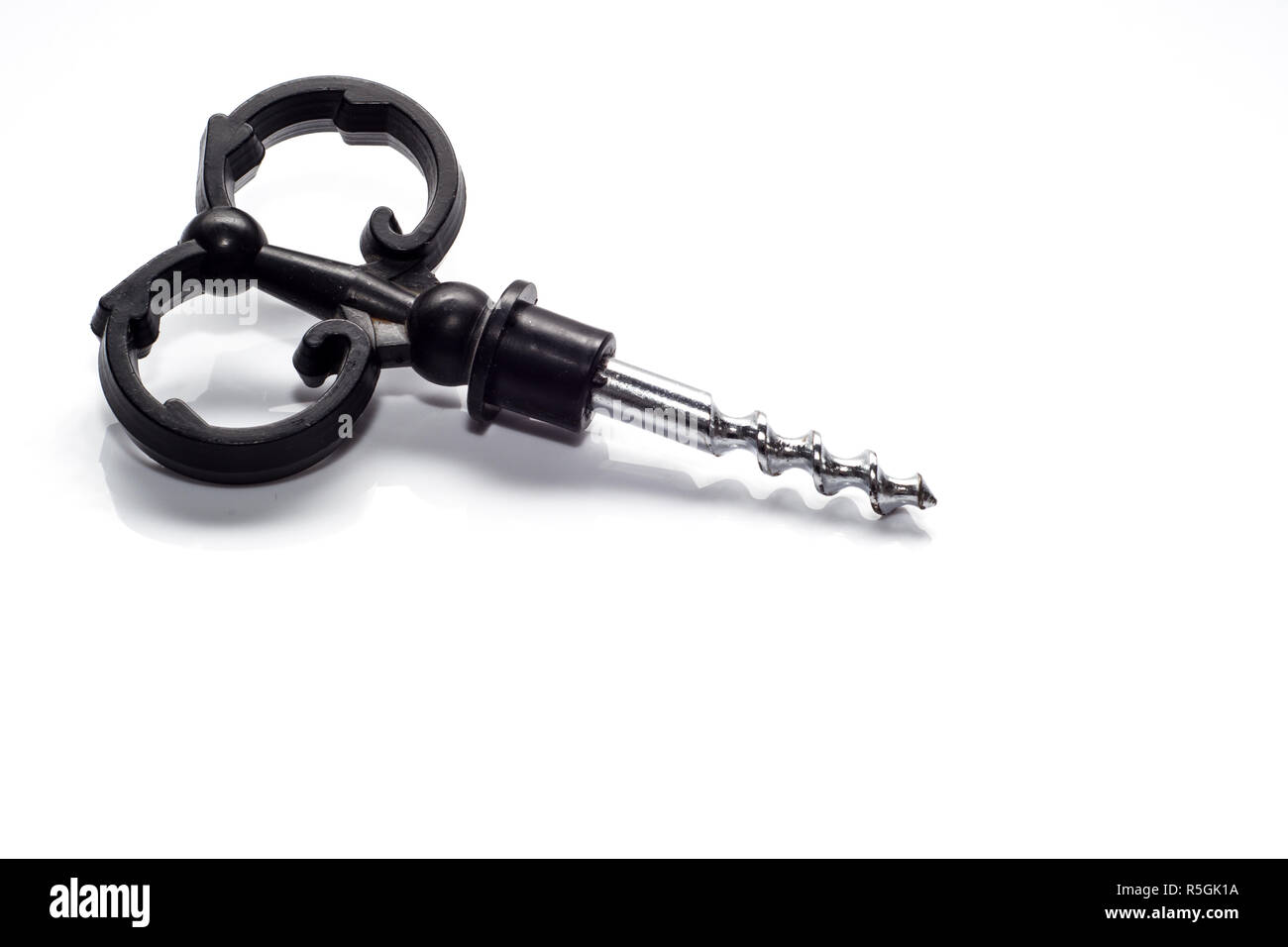 Corkscrew isolated on a white background Stock Photo - Alamy