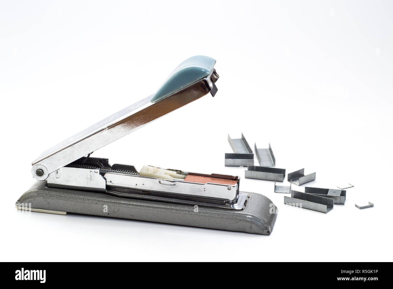 Stapler and staple isolated on white background Stock Photo - Alamy