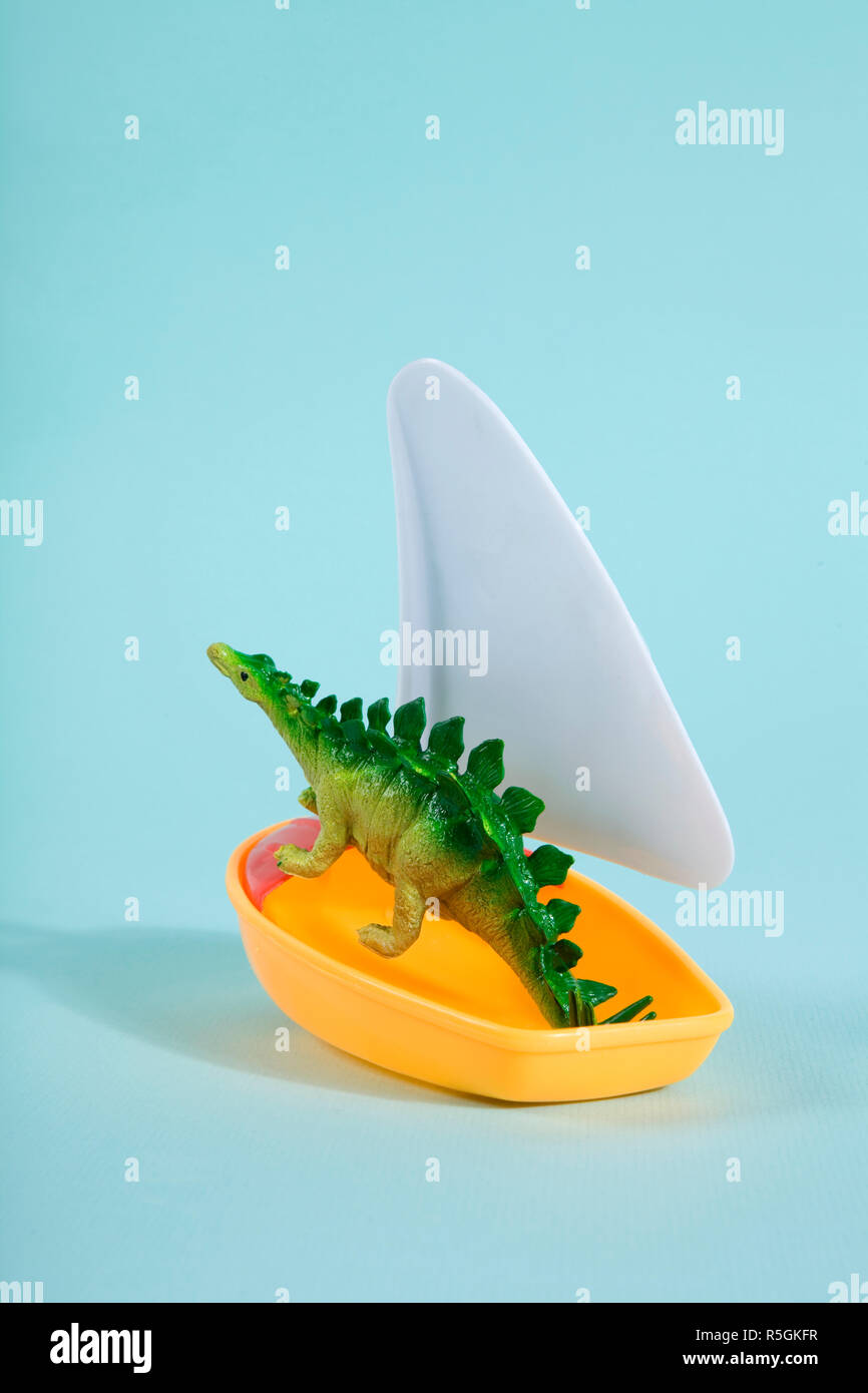 dinosaur on a boat Stock Photo - Alamy