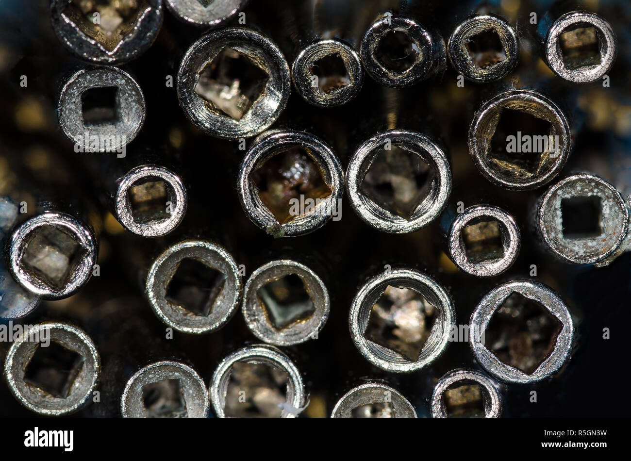 Abstract: View Into the Barrel of a Set of Antique Pocket Watch Keys ...