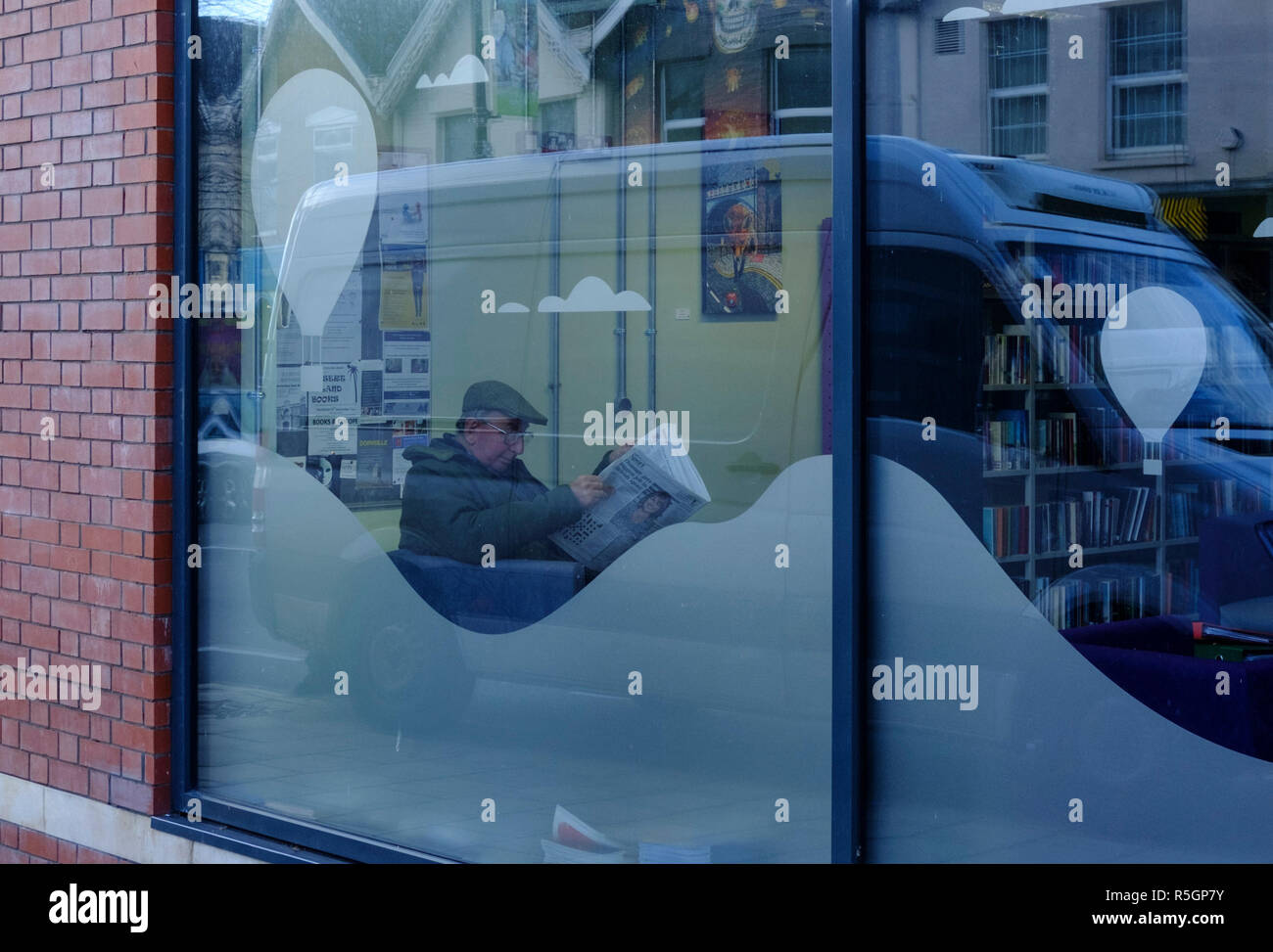 Around the Bishopston area of Bristol. Man in the window of Bishopston ...