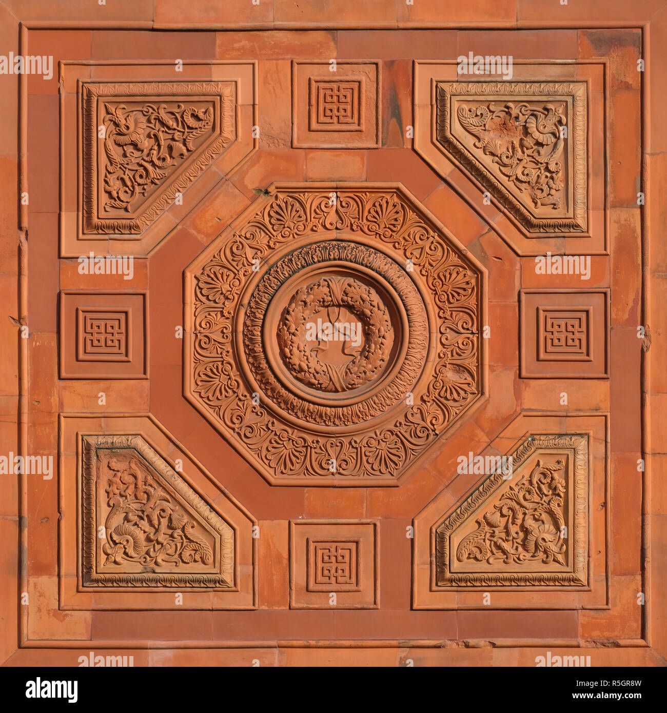 historical wall made of terracotta with oak rim and meander tile Stock ...