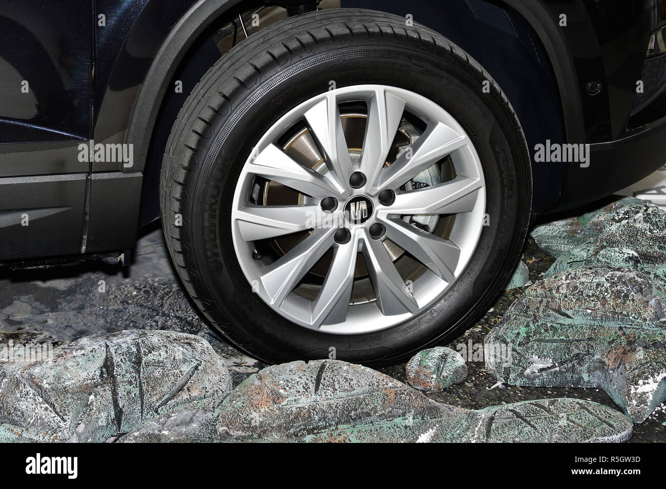 The front wheel of the car brands Seat close up in a shopping center ...