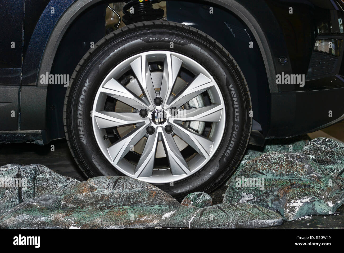 The front wheel of the car brands Seat close up in a shopping center ...